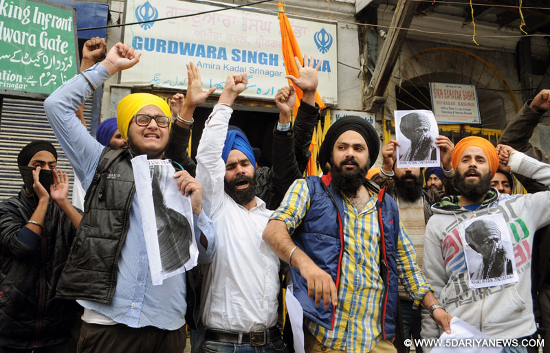 Killing of Sikh youth:Sikhs set effigy of Indian Home Minister on fire