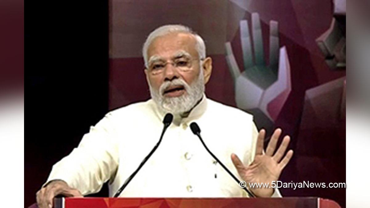 Modi's loud message sans loudspeaker: Together we stand, divided they fall