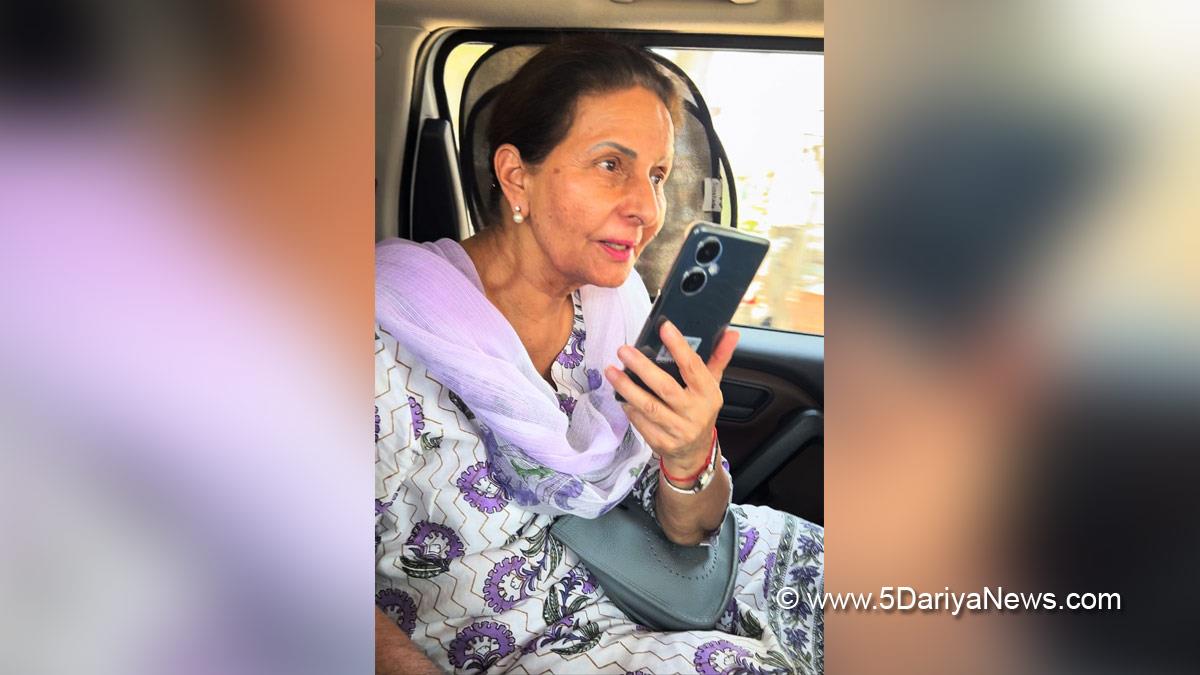 Preneet Kaur speaks to 8,000 workers through an audio bridge