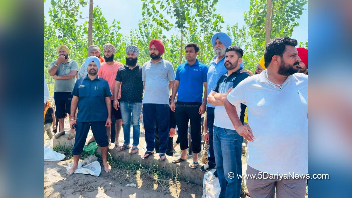 Construction of temporary ring bandh in Sasrali colony advances on war ...