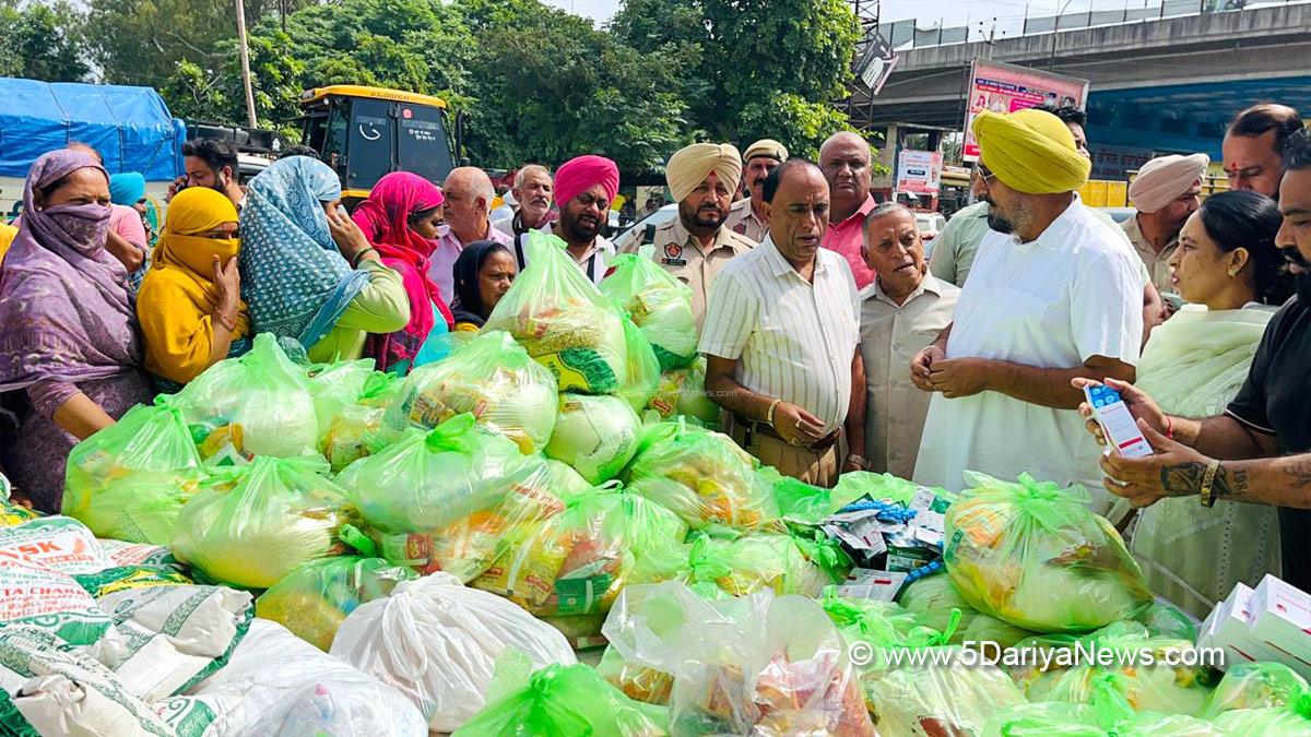 MLA Kuljit Singh Randhawa distributes relief material to rain-affected ...